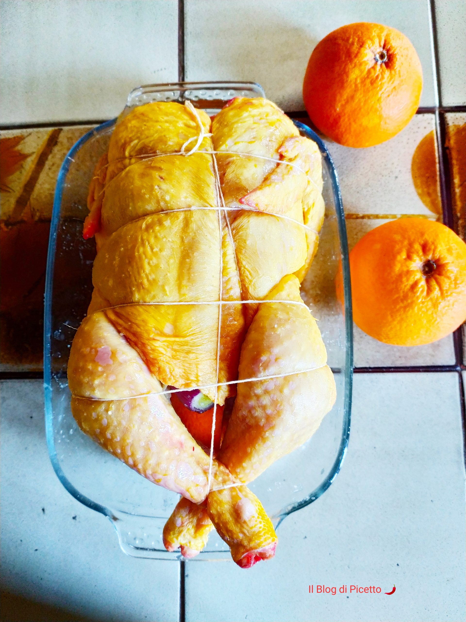 Pollo intero arrosto al forno all'arancia